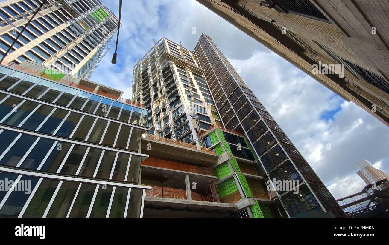Construction of the XI buildings which twist as they rise near the ...