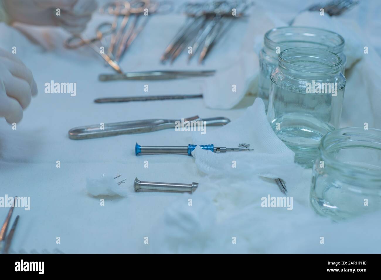 Skull clamp with pins and antiseptic solution for head fixation in ...