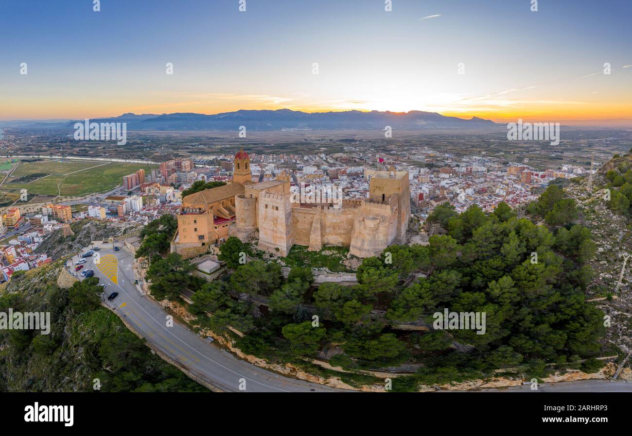 Aerial sunset panorama view of Cullera castle and popular seaside ...