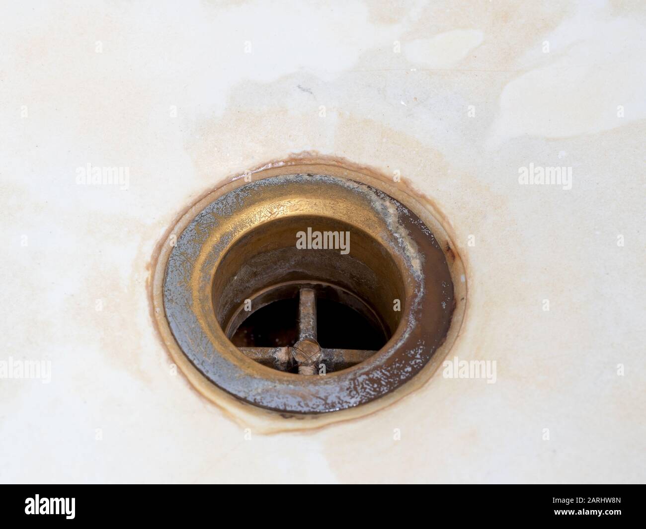 Old rusty brown drain cover hi-res stock photography and images - Alamy