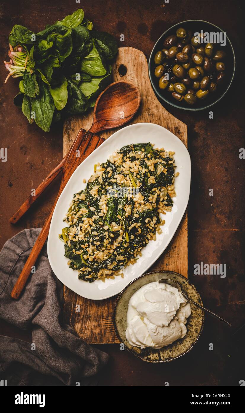 Flat-lay of Turkish traditional dish Bulgur and spinach Stock Photo - Alamy
