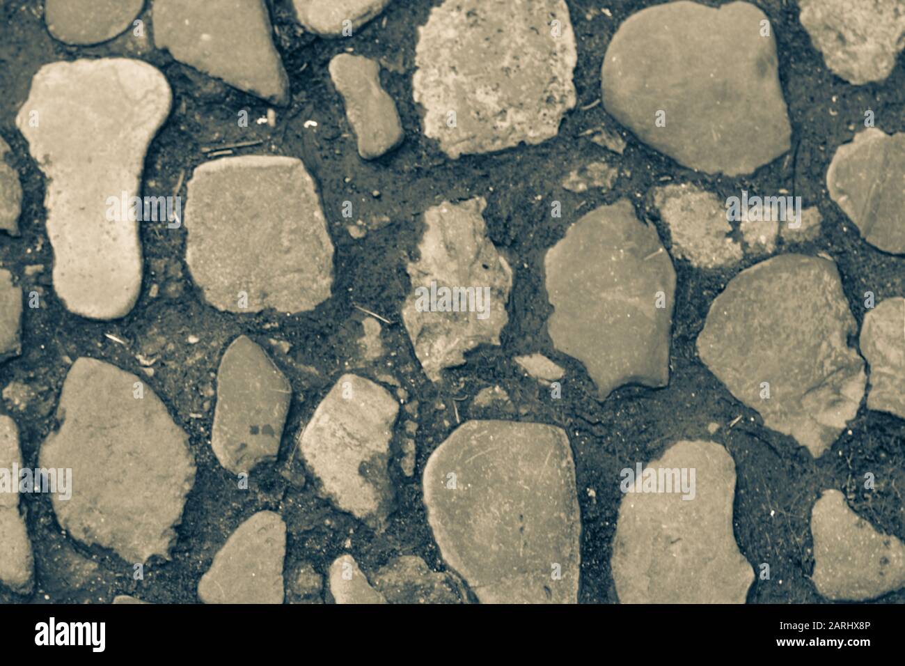 old path paved with cobblestones background Stock Photo - Alamy