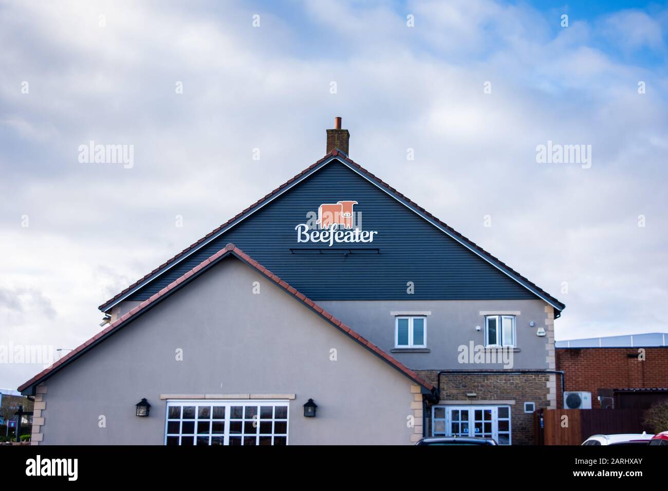 The beefeater logo and text on the end of the restaurant building ...