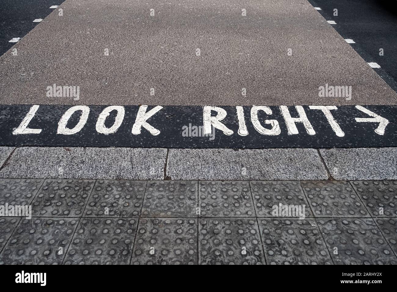 "Look right" road marking on a pedestrian crossing, reminding ...