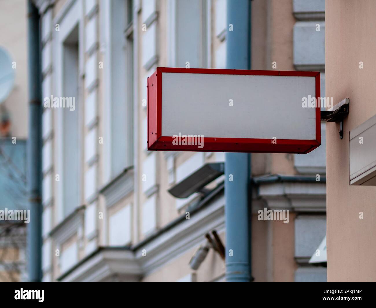 Box real sign on wall of building. Dark blue rectangular signboard of ...