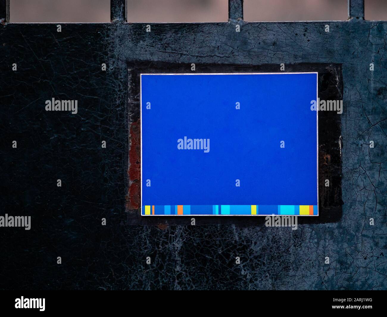 Box real sign on wall of building. Dark blue rectangular signboard of ...