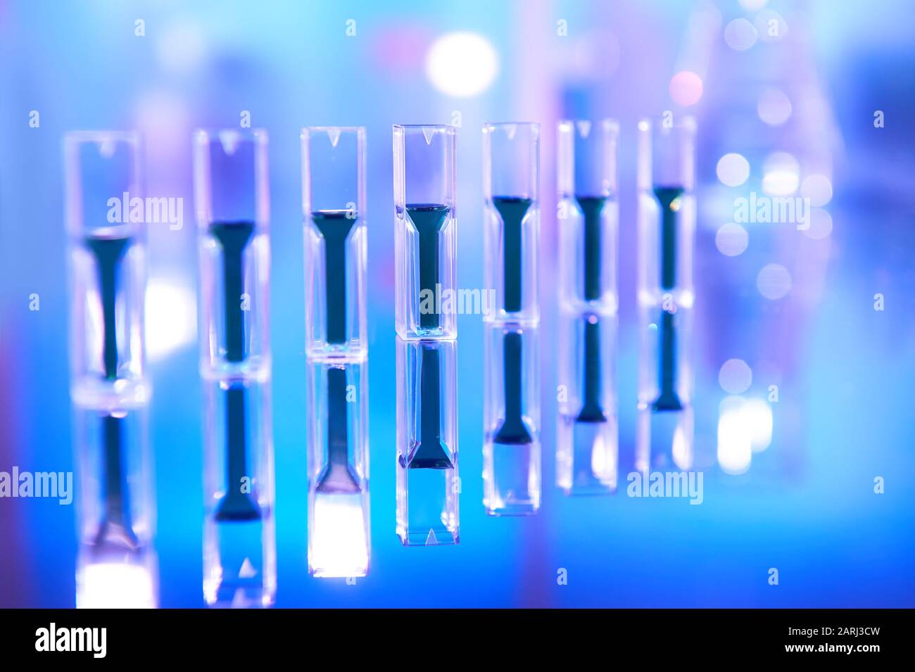 Scientific background in vibrant neon colors, purple, blue and ...