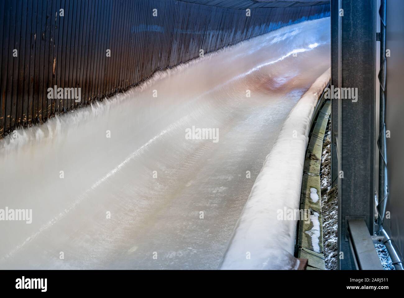 Bobsleigh ice channel in Winterberg. The digital clock measures the ...