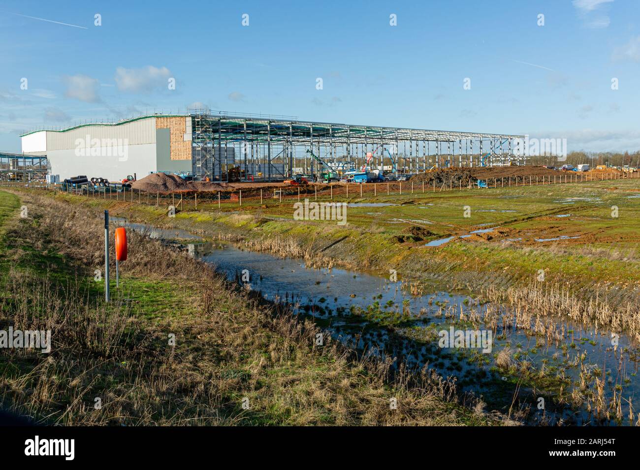 A steel framed warehouse under construction Stock Photo - Alamy