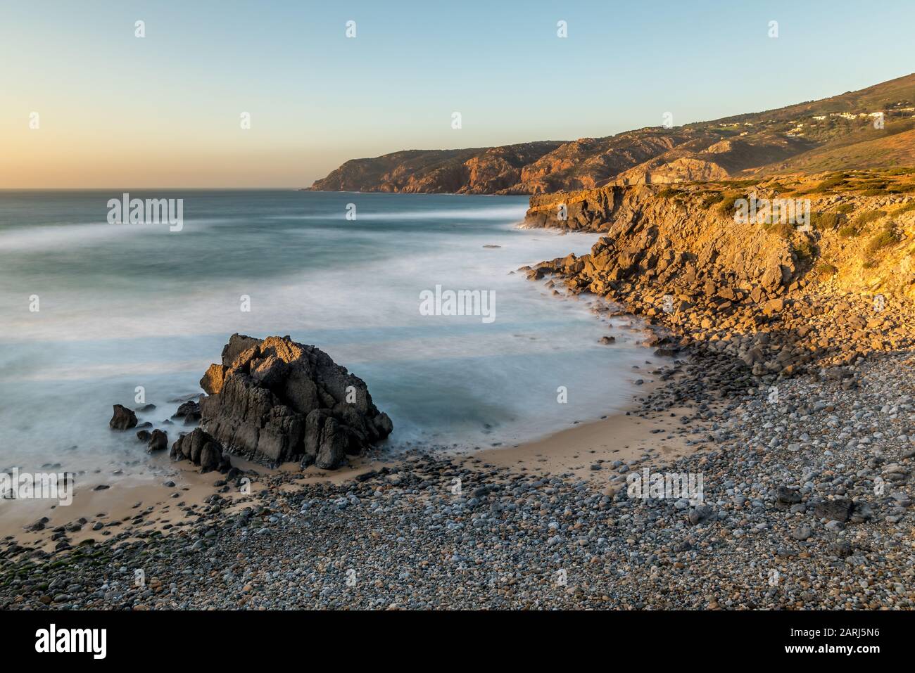 Long exposure of landmark Abano beach on the Sintra coastline in ...
