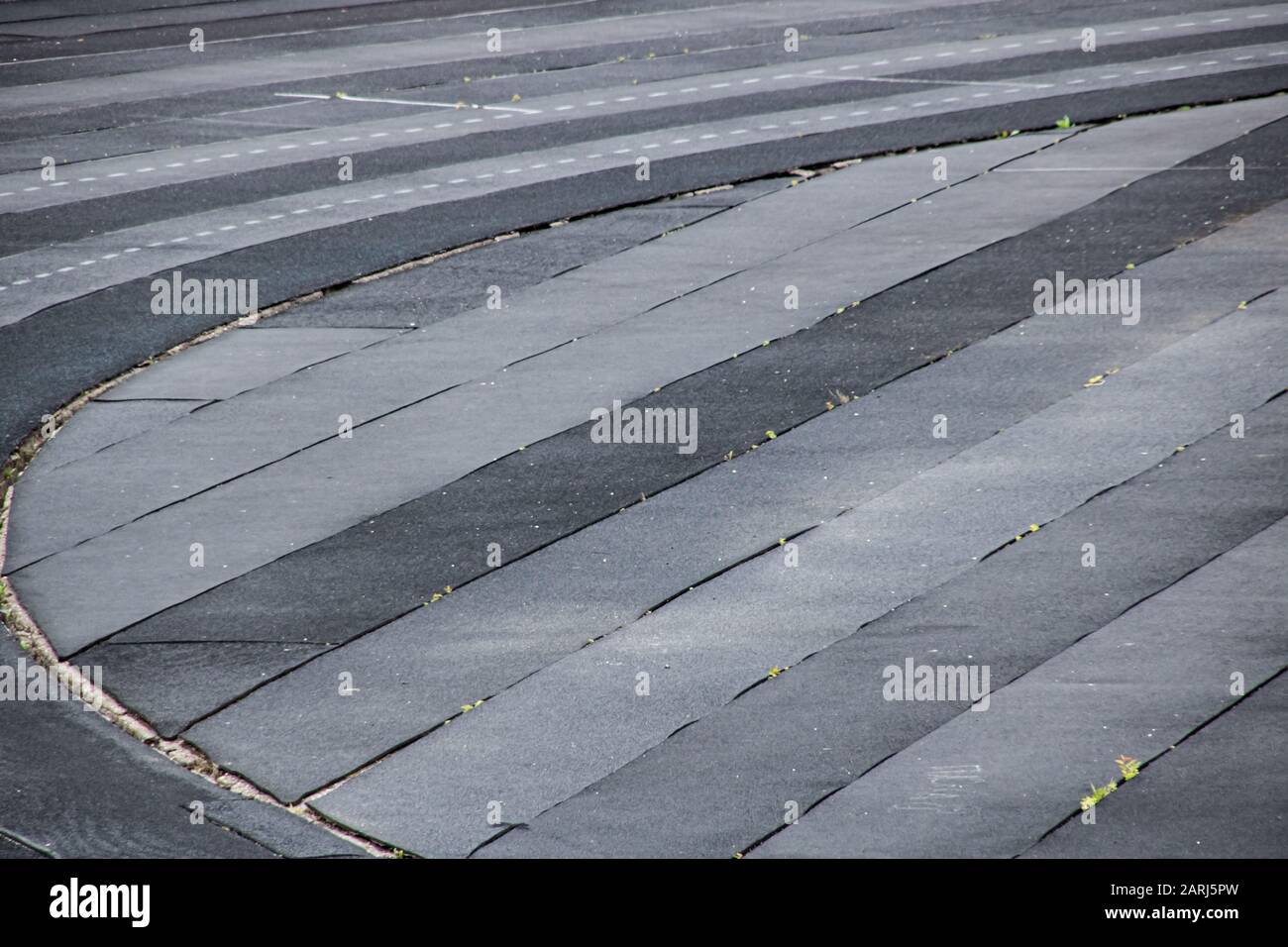 Gray running track in the stadium close up, background Stock Photo - Alamy