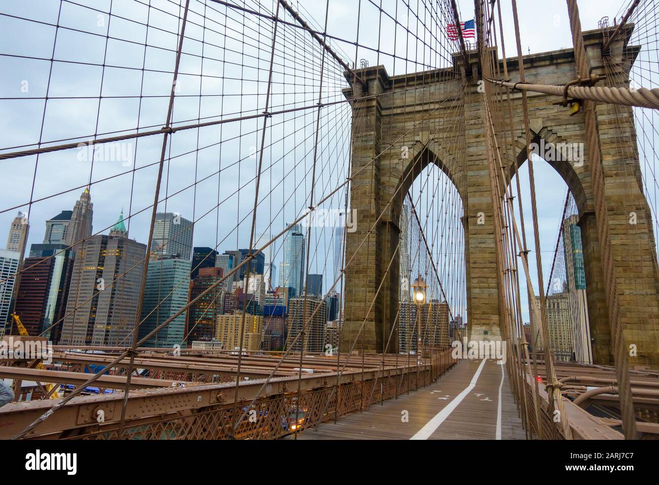 People walking in Brooklyn bridge at day time Stock Photo - Alamy