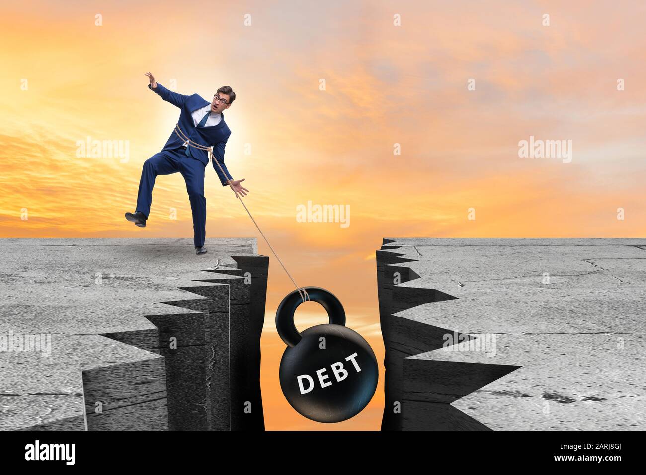 The concept of debt and load with businessman Stock Photo - Alamy