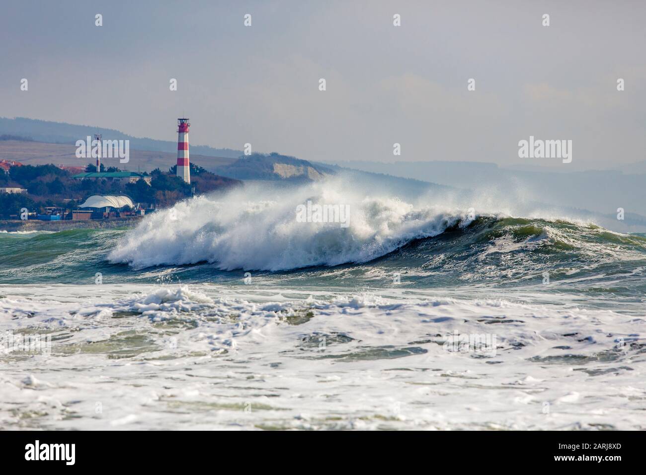Beautiful, big storm waves at the entrance to Gelendzhik Bay. In the ...