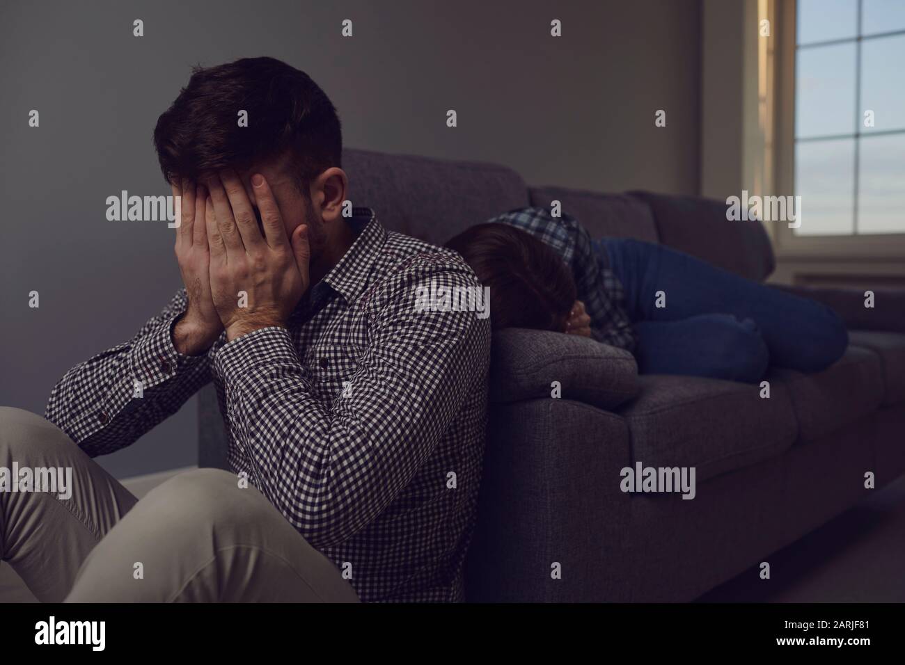 Couple Despair Sofa High Resolution Stock Photography and Images - Alamy