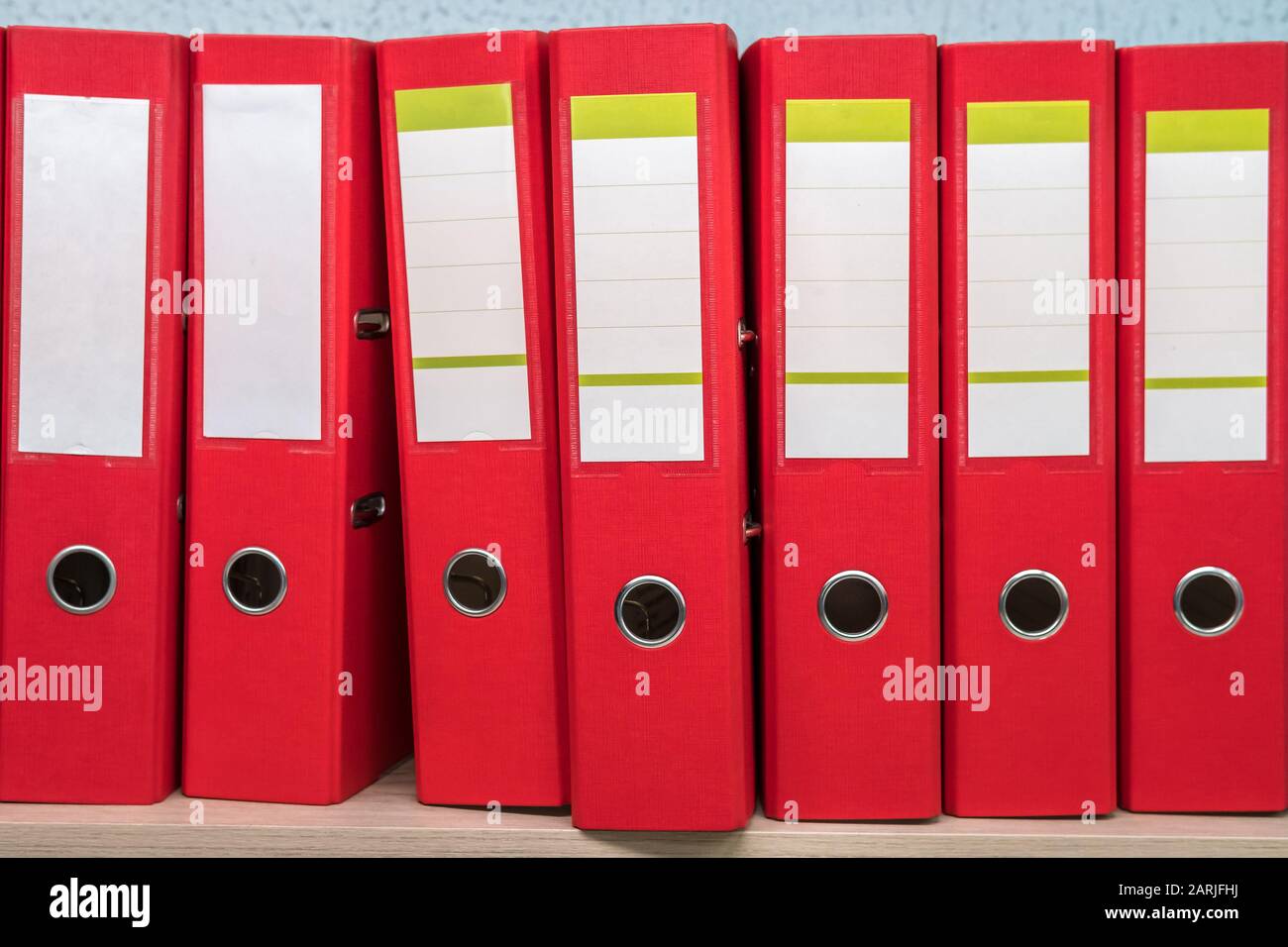 Stack of colorful file folders with papers on white background Stock ...