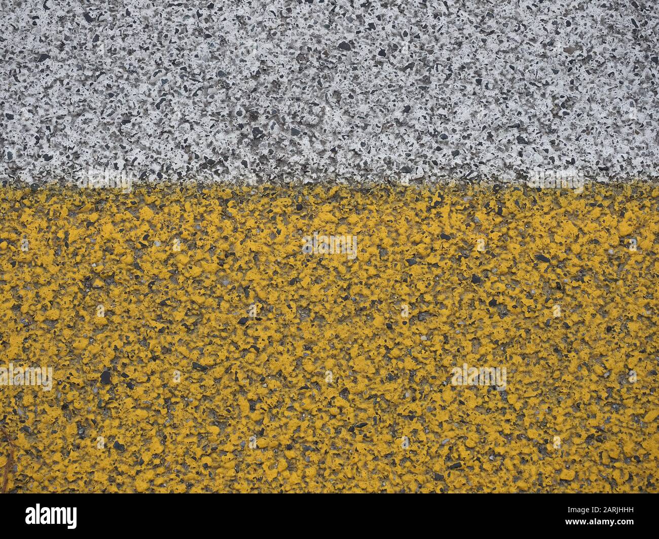 white and yellow tarmac texture useful as a background Stock Photo - Alamy