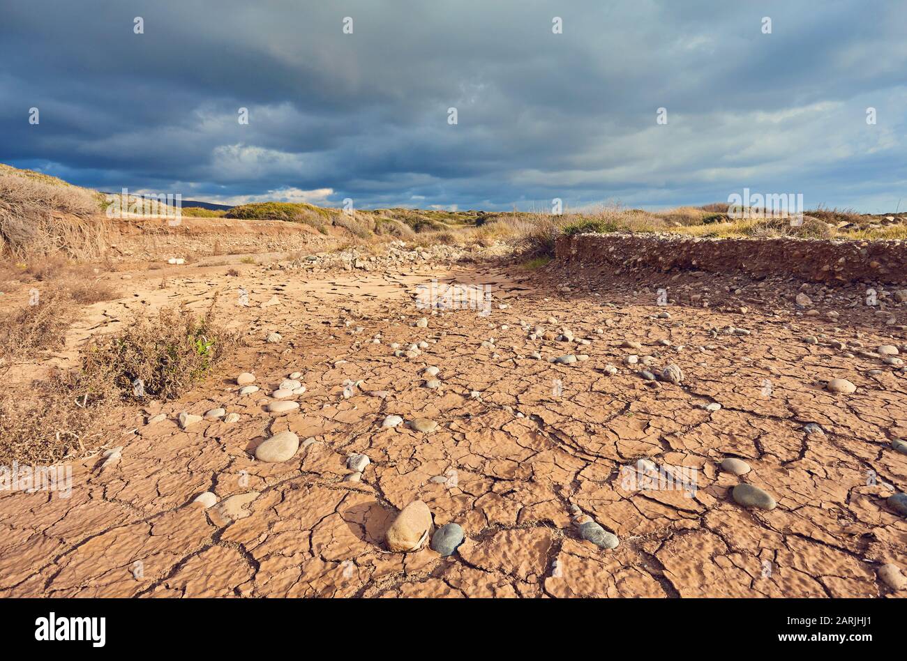 global warming. deep blue sky with clouds over drought earth Stock ...