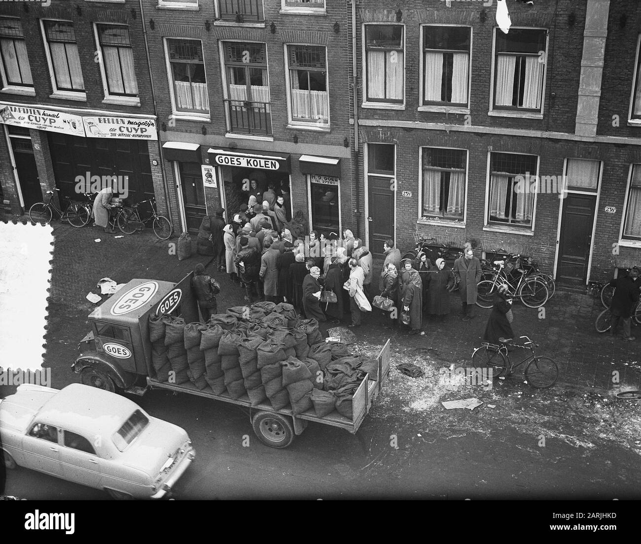 In line for a serving coal Date: February 24, 1956 Keywords: COOL, rows ...
