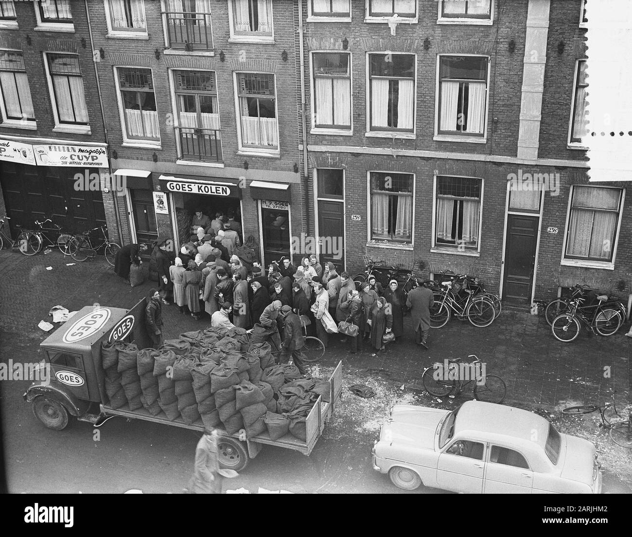 In line for a serving coal Date: February 24, 1956 Keywords: COOL, rows ...