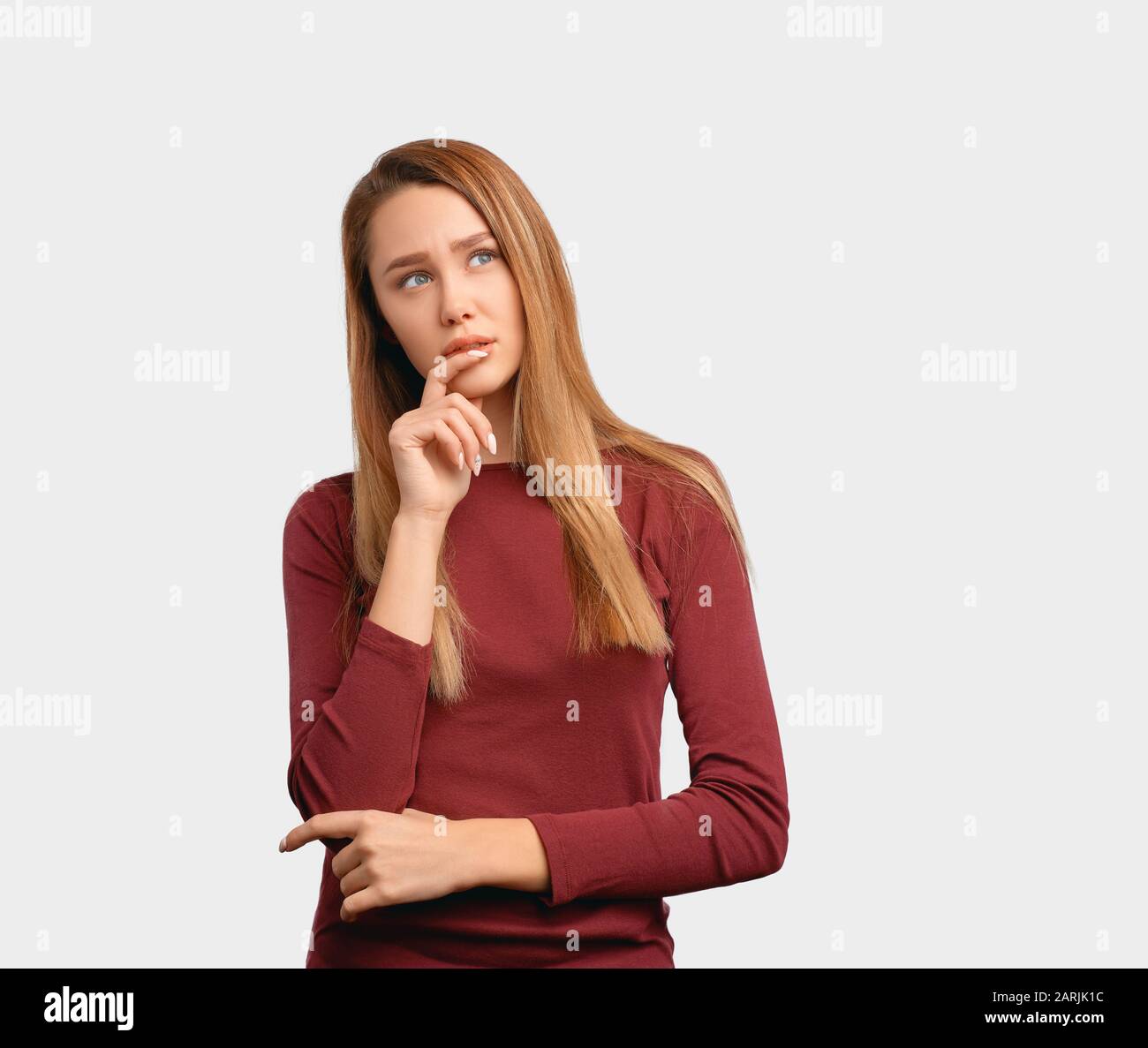 Hand under chin gesture hi-res stock photography and images - Alamy
