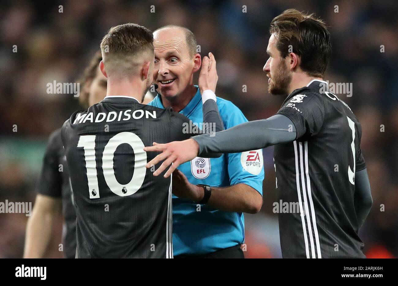 Leicester City's James Maddison speaks to referee Mike Dean during the ...