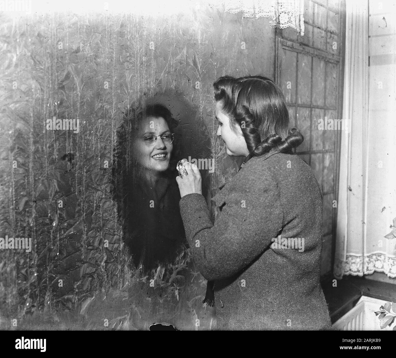 Miss tries to look through frozen windows Date: January 2, 1946 ...