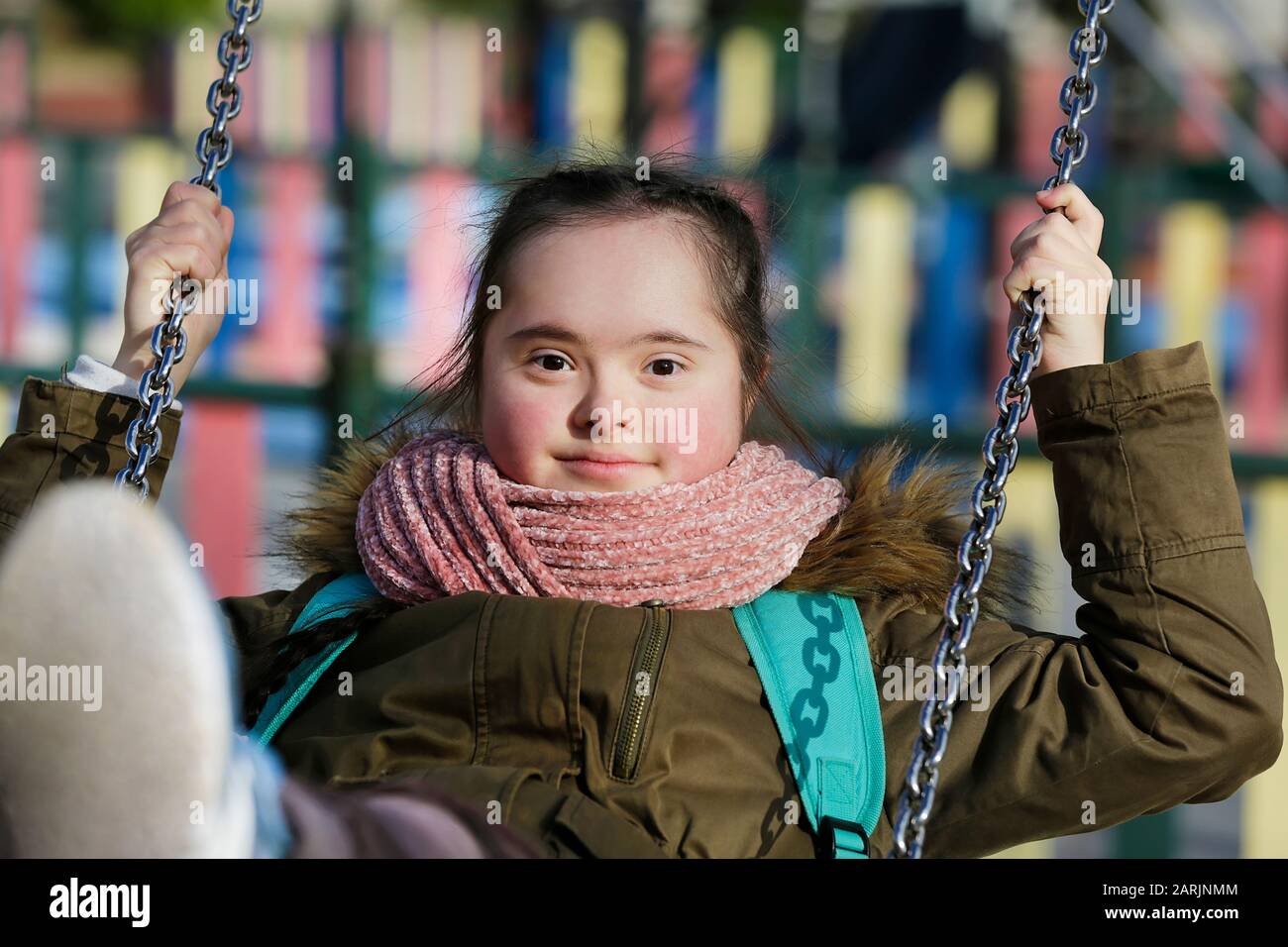 Nice girl having fun on the playground Stock Photo - Alamy