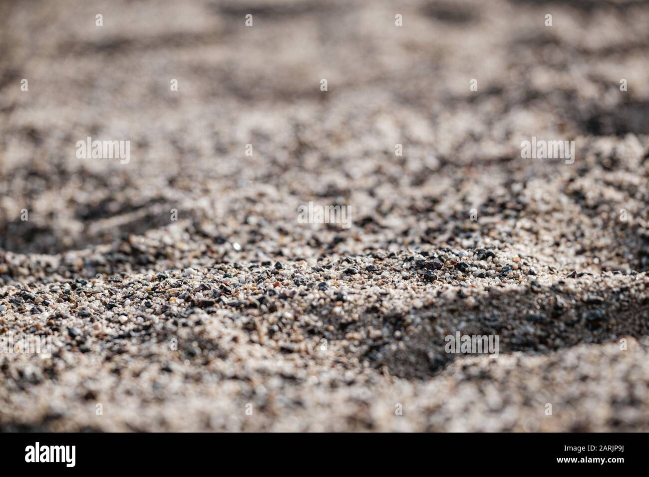 Sand furrows create a marco landscape Stock Photo - Alamy