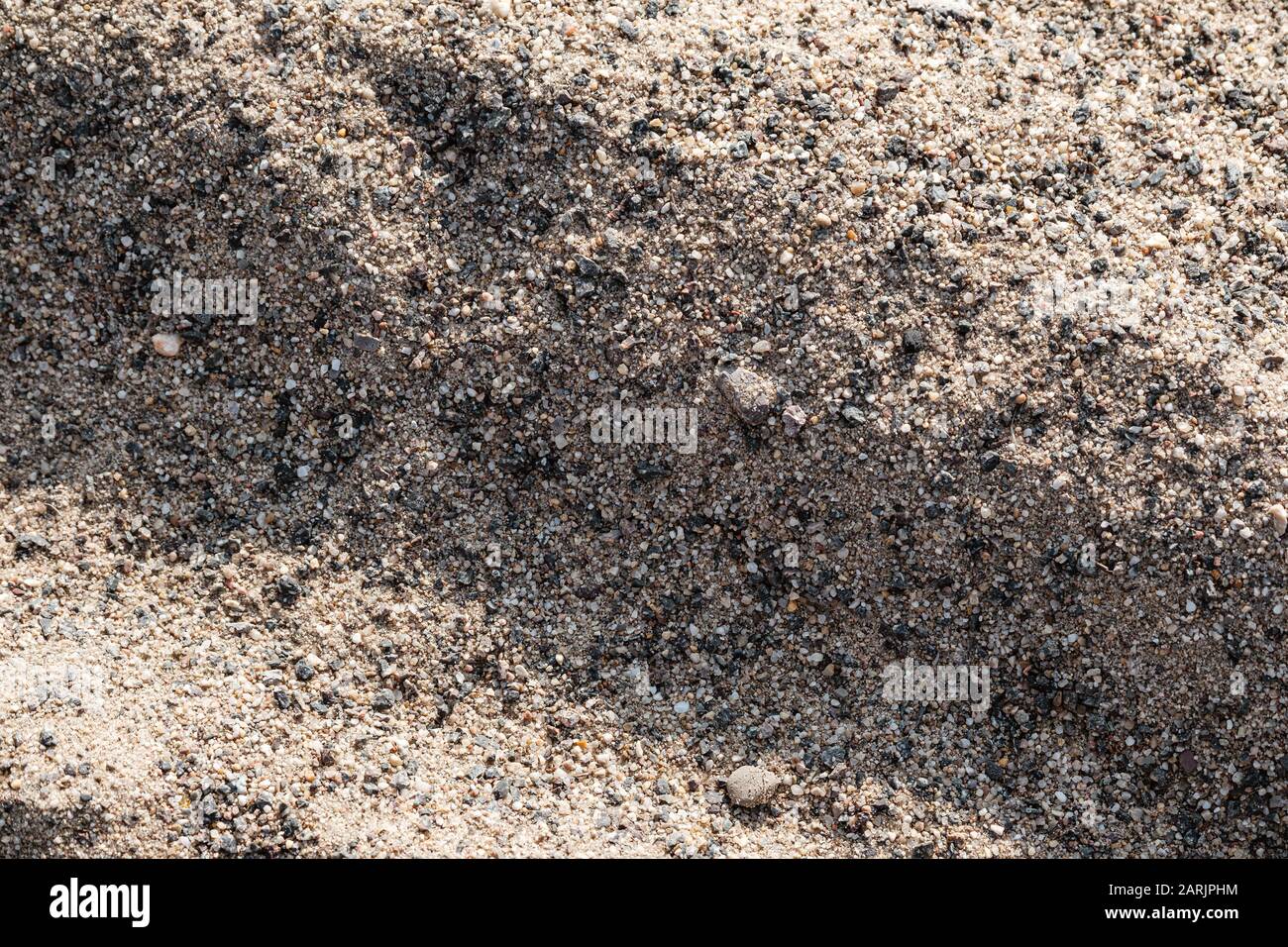 Sand furrows create a marco landscape Stock Photo - Alamy