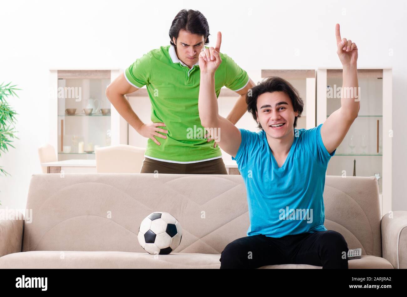 Two friends enjoying game soccer hi-res stock photography and images ...