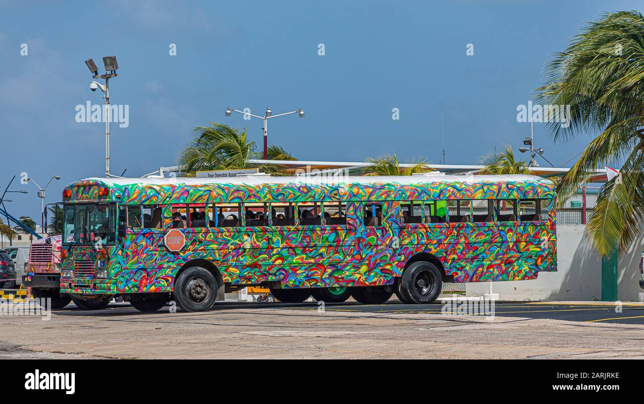 Wild Painted Tour Bus in Aruba Stock Photo - Alamy