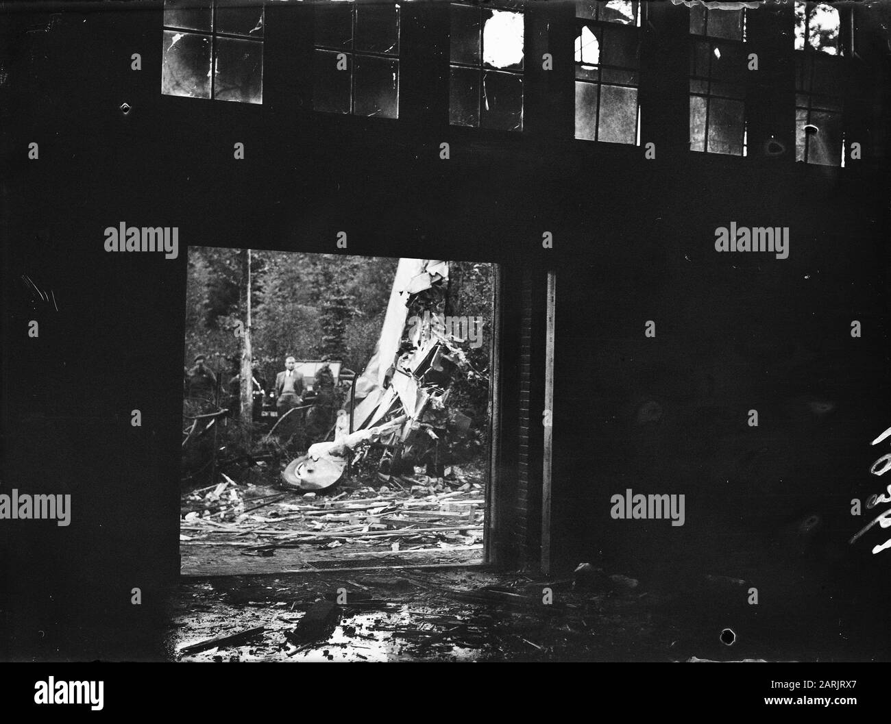 Airplane crash Apeldoorn. The remains of the Fairey Firefly next to the ...