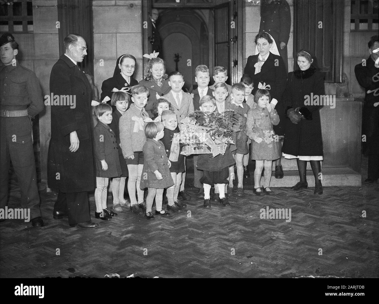Children offering flowers Black and White Stock Photos & Images - Alamy