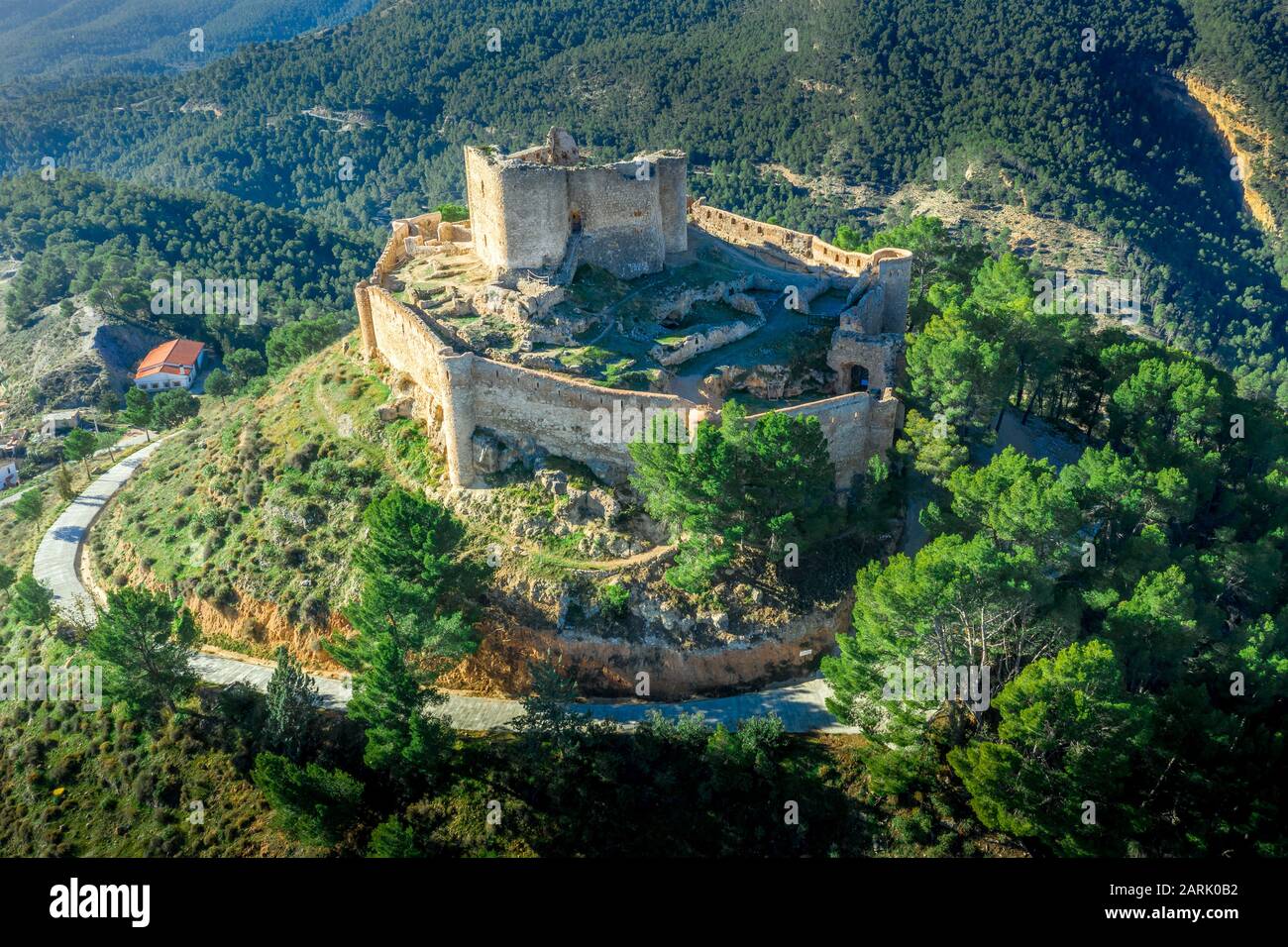 Aerial view of Jalance castle in Spain on a hilltop from the 12th ...