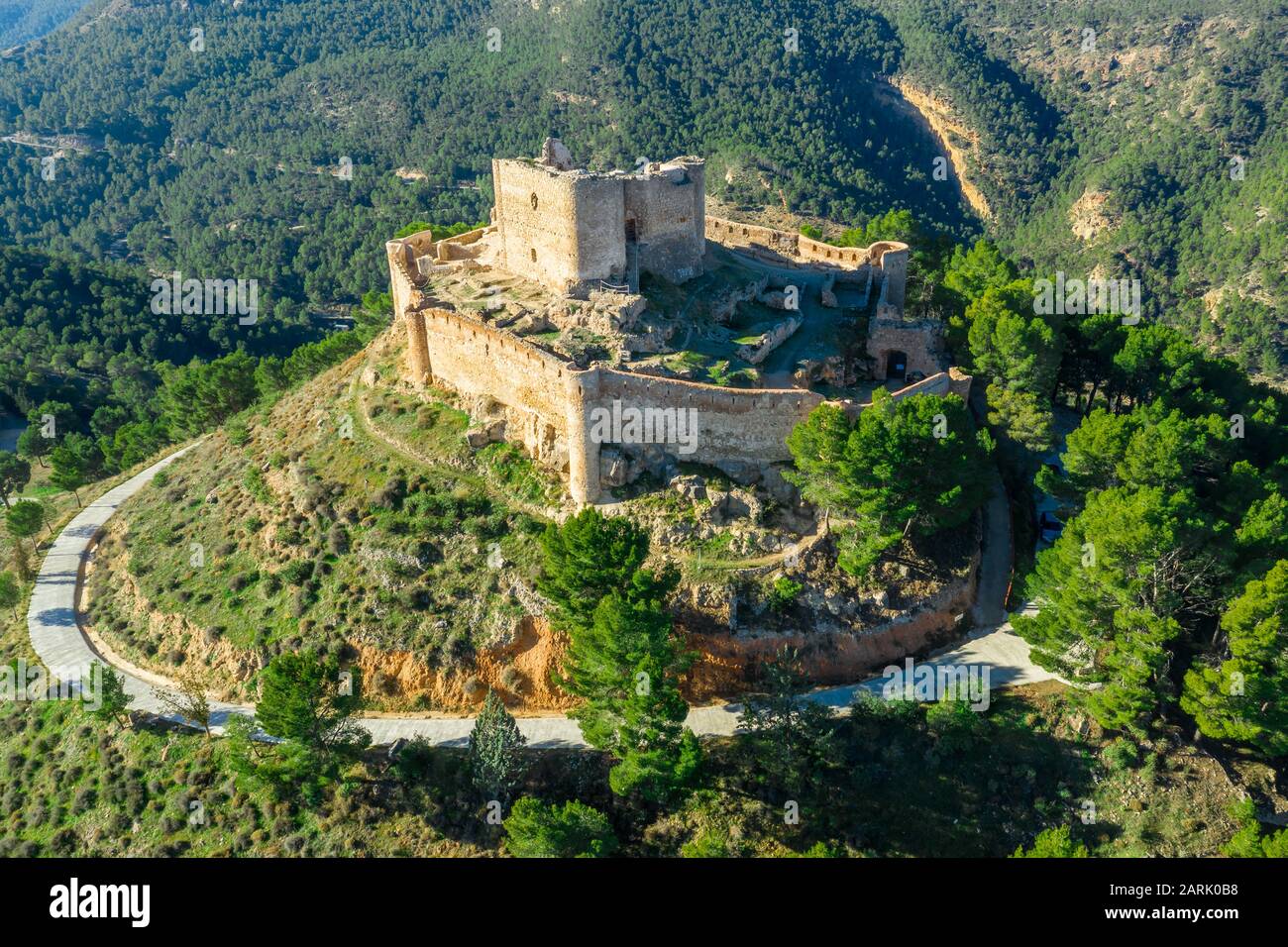 Aerial view of Jalance castle in Spain on a hilltop from the 12th ...