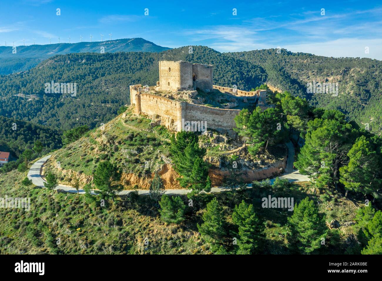 Aerial view of Jalance castle in Spain on a hilltop from the 12th ...