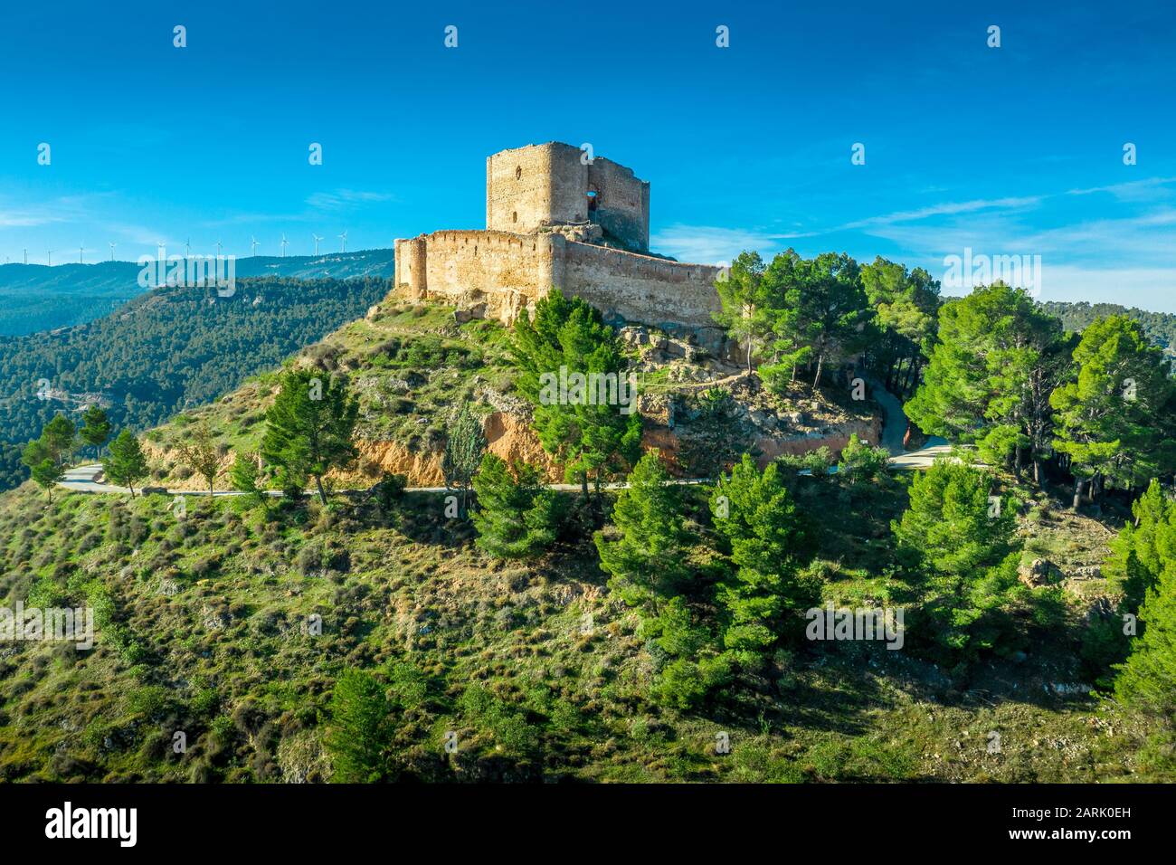 Aerial view of Jalance castle in Spain on a hilltop from the 12th ...