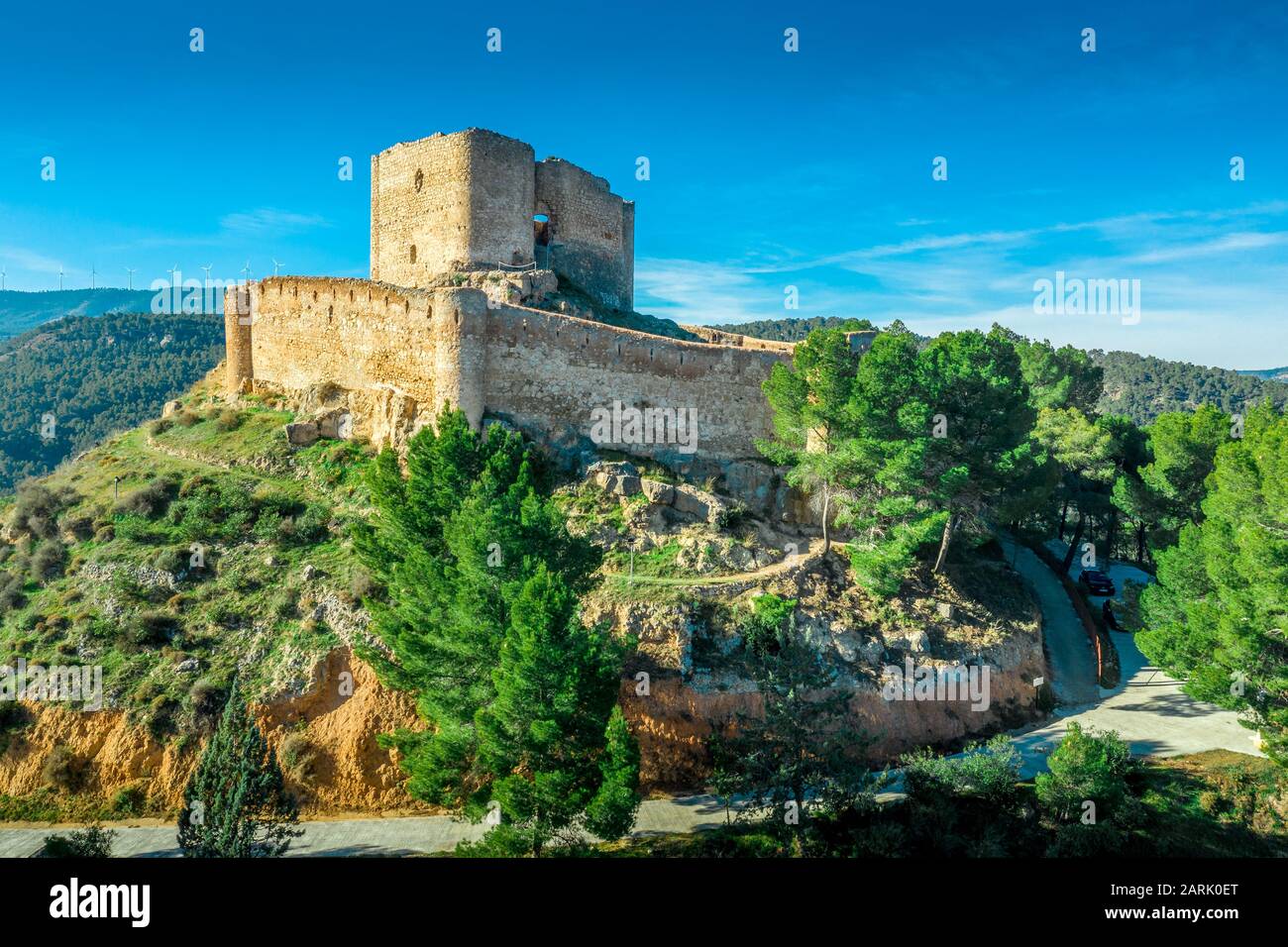 Aerial view of Jalance castle in Spain on a hilltop from the 12th ...