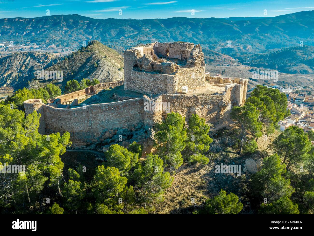 Aerial view of Jalance castle in Spain on a hilltop from the 12th ...