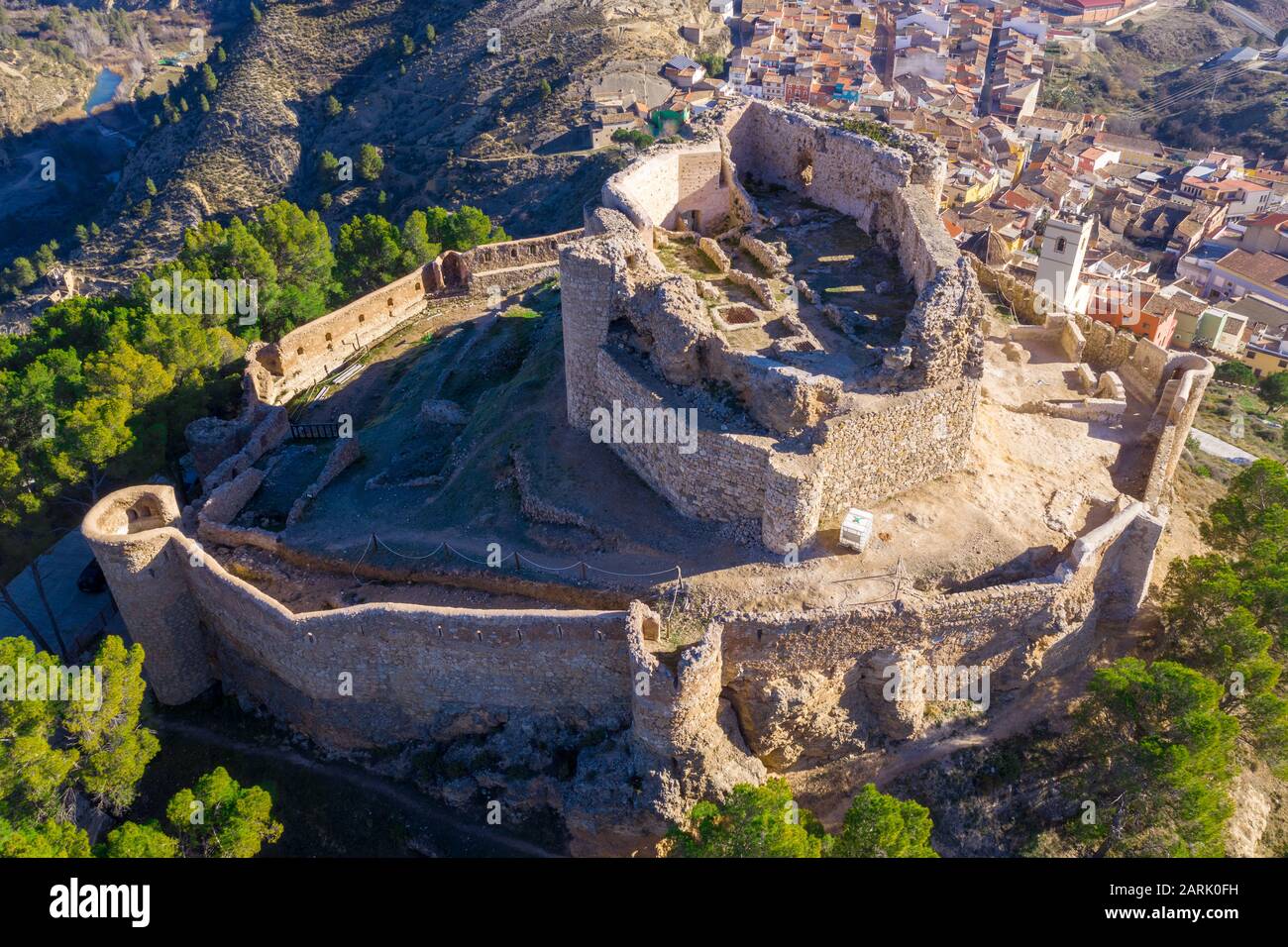Aerial view of Jalance castle in Spain on a hilltop from the 12th ...