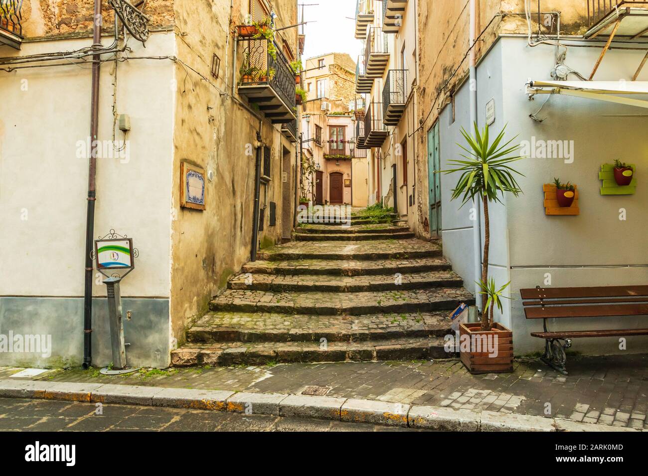 Italy, Sicily, Palermo Province, Castelbuono. Stairs on a narrow side ...