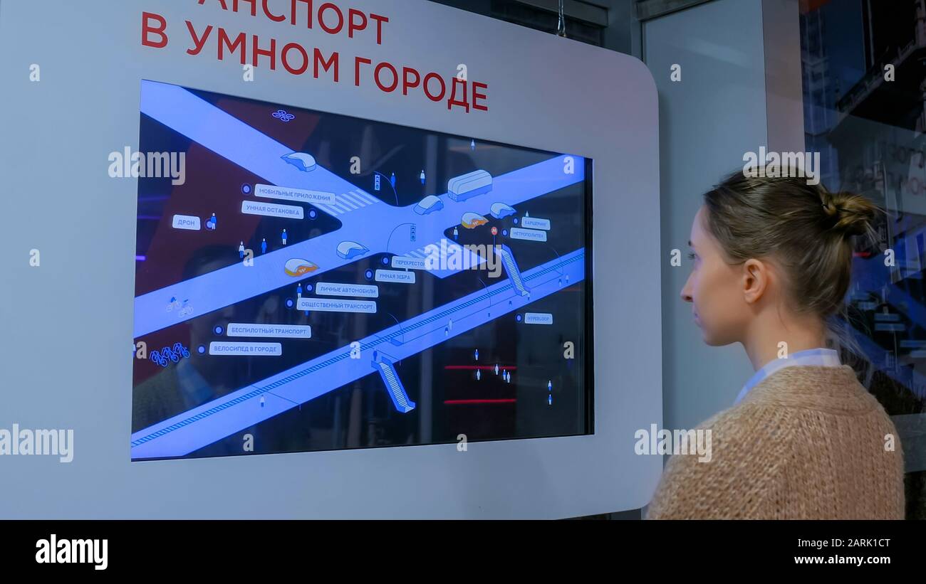 Woman watching presentation moscow public hi-res stock photography and ...