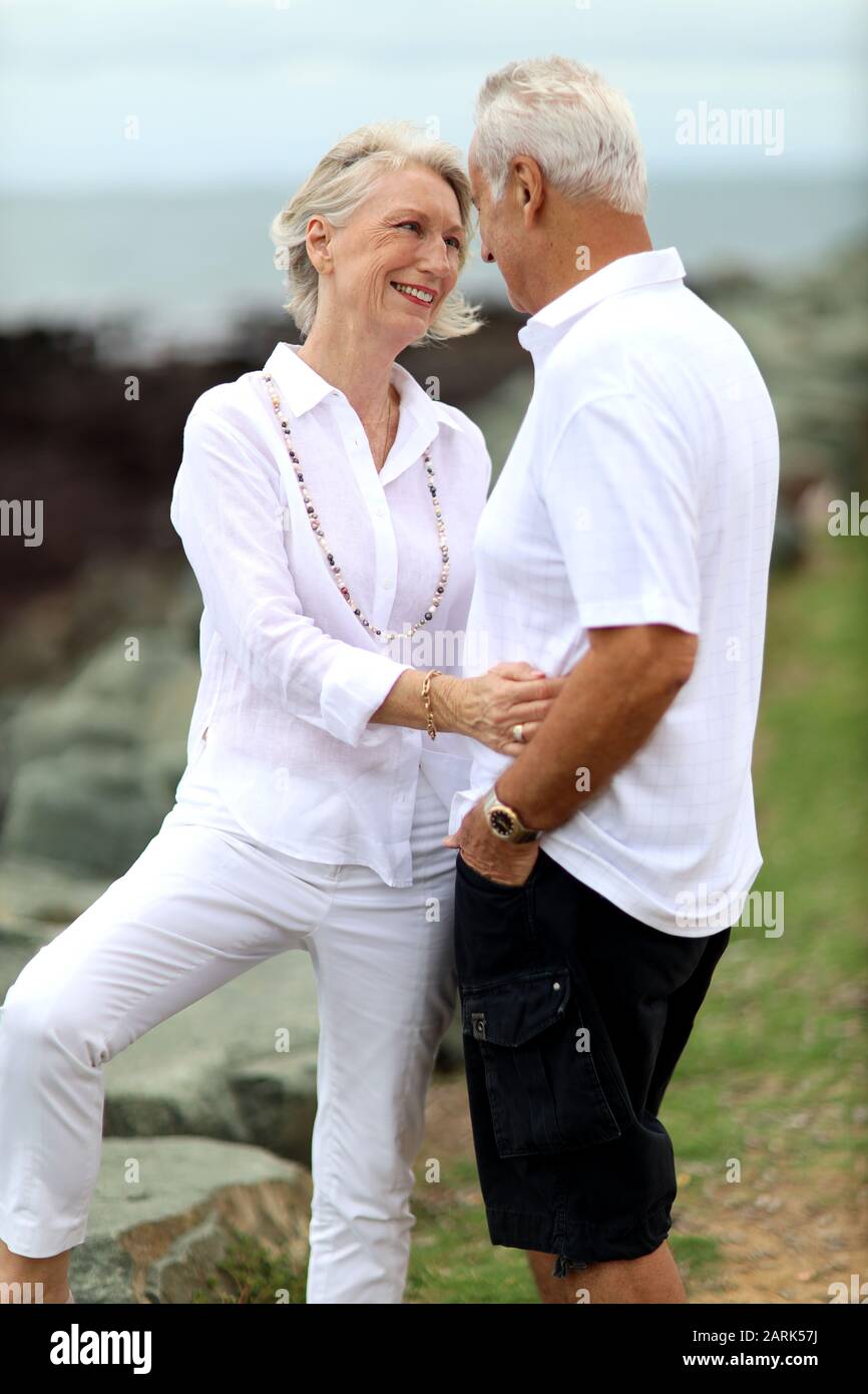 Mature Married Couple A Cute Older Couple Caressing Each Other As They
