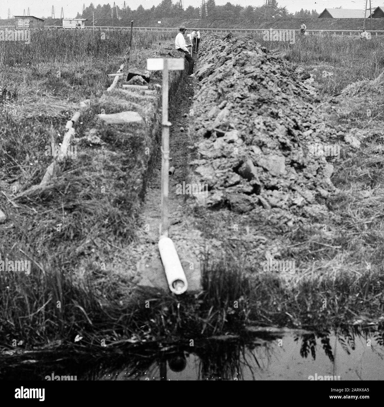 setting out a drain Date: undated Keywords: drainage Stock Photo - Alamy
