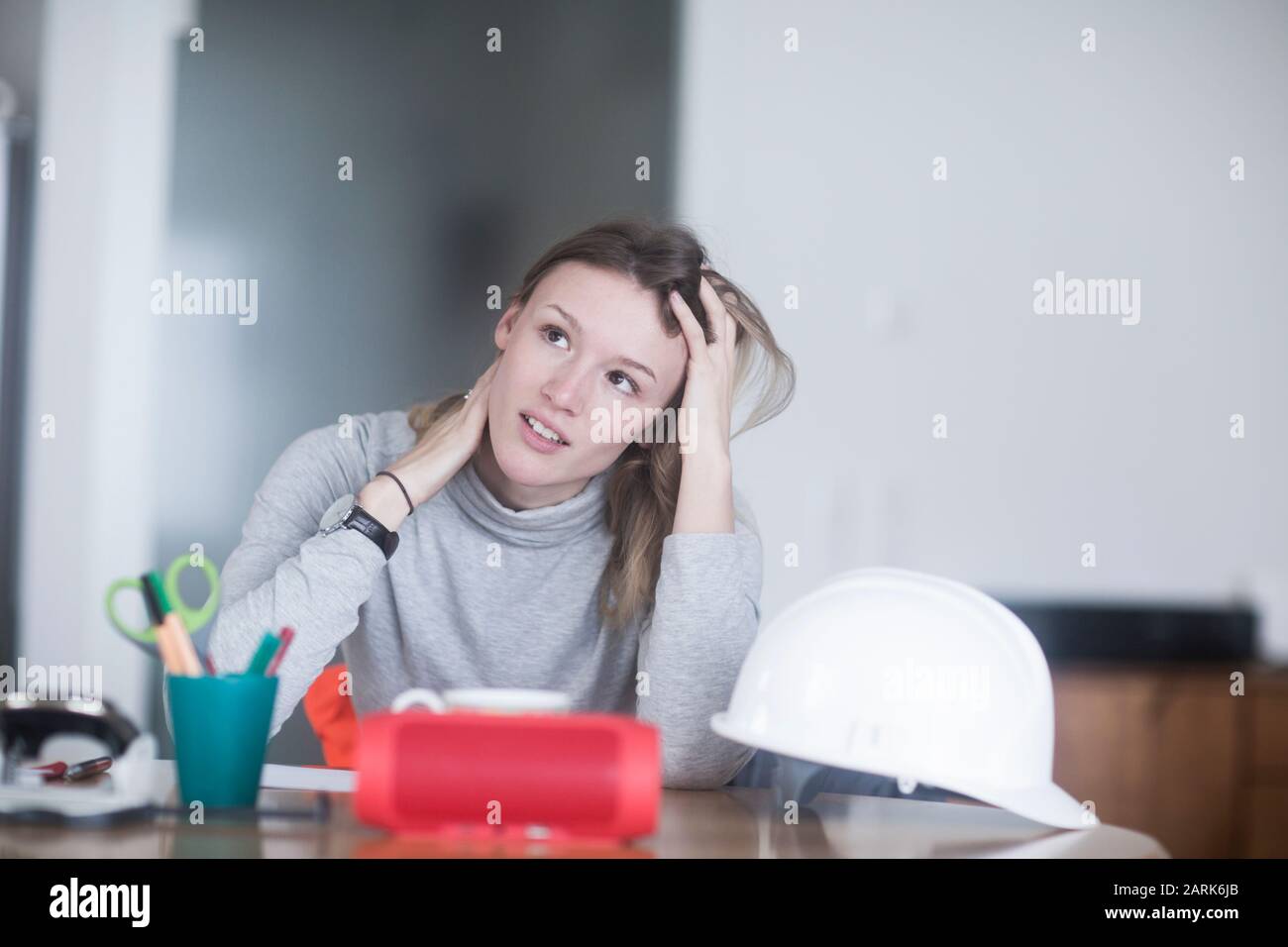 young woman with long hair learning at home Stock Photo - Alamy