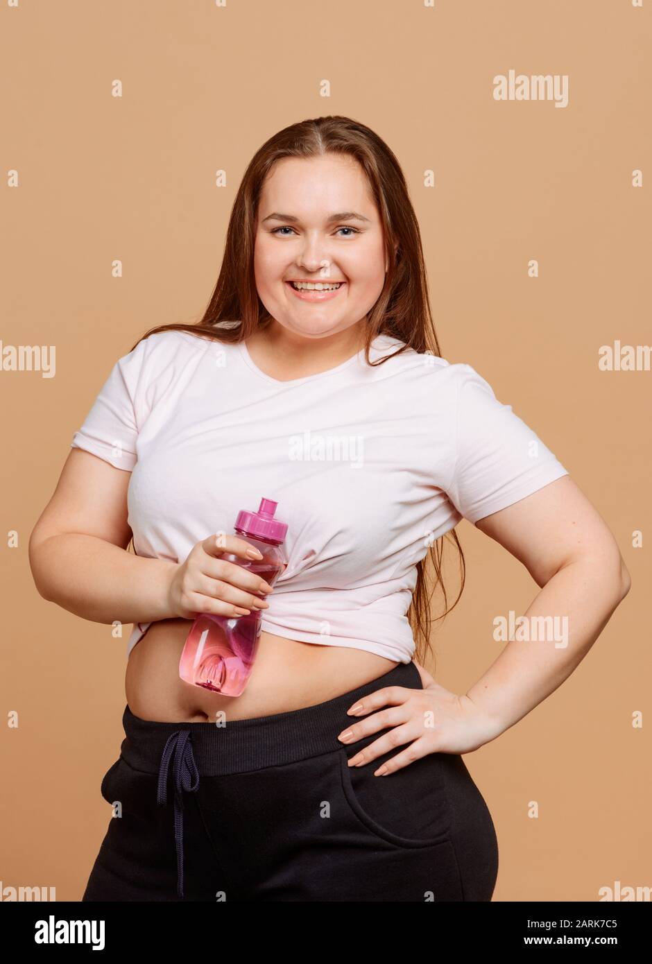 Happy overweight woman hi-res stock photography and images - Alamy