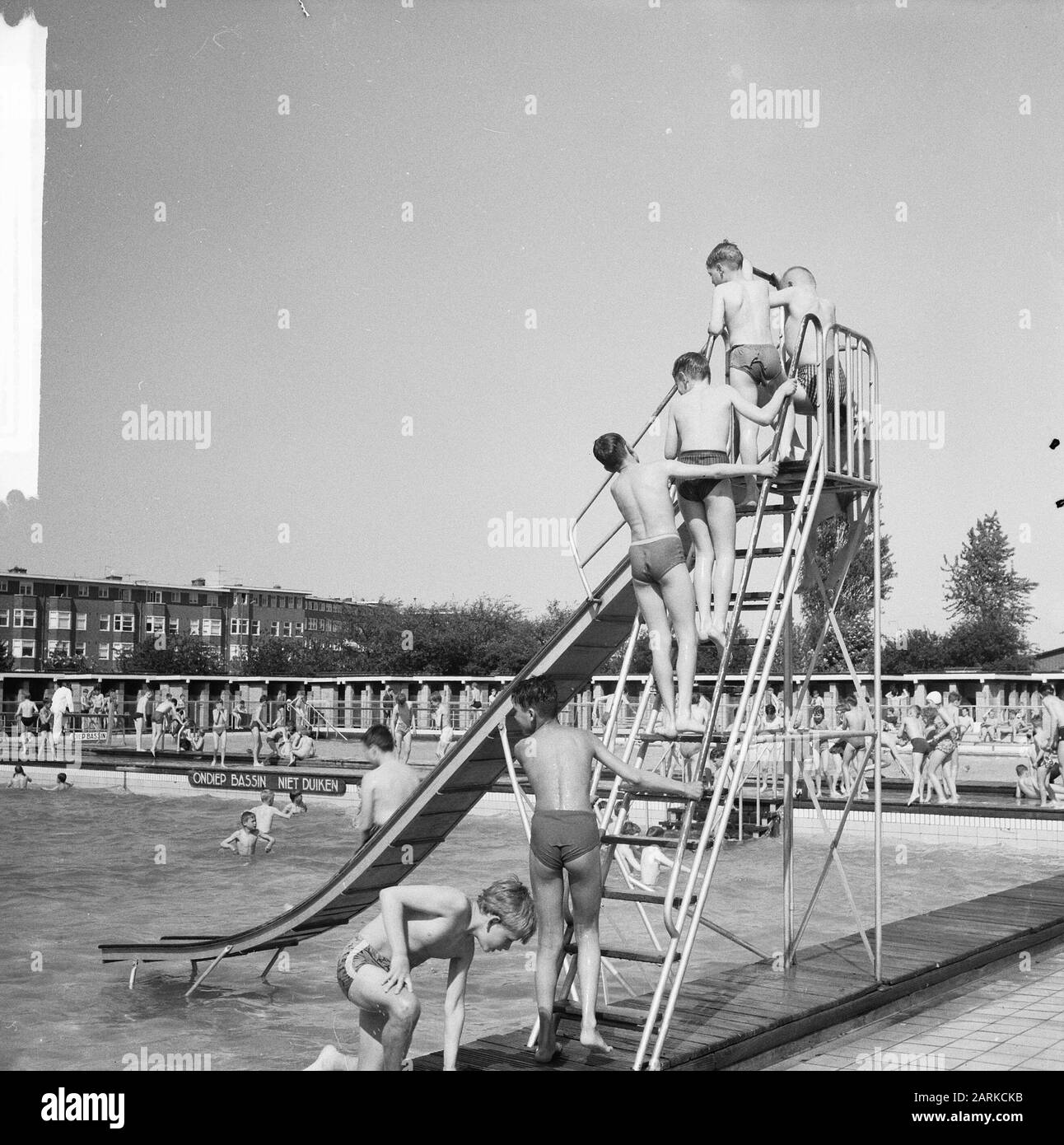 Busy during hot day in capital pool Date: June 6, 1962 Keywords: crowds ...