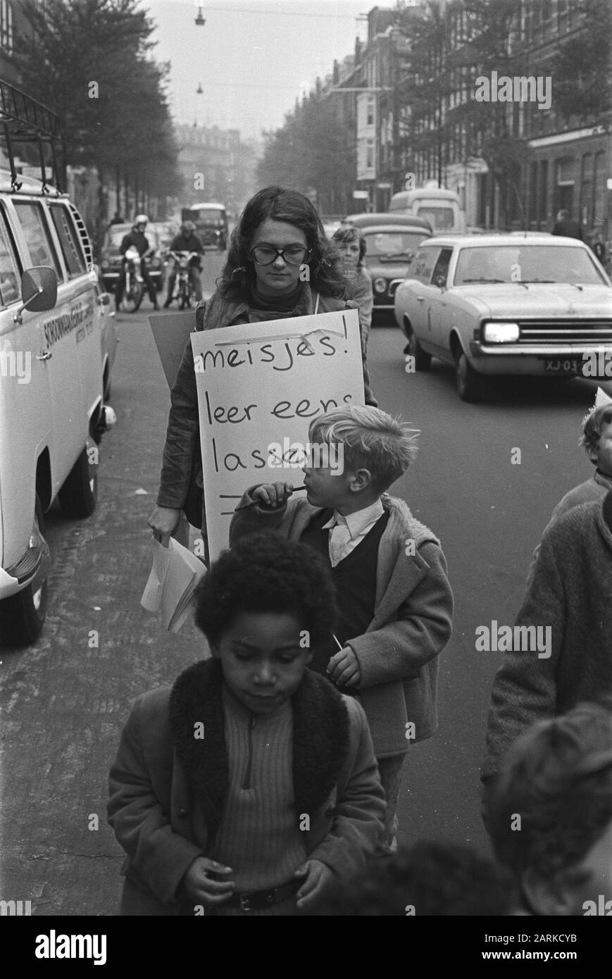 Dressed children and Dolle Minas demonstrate with sign in ...