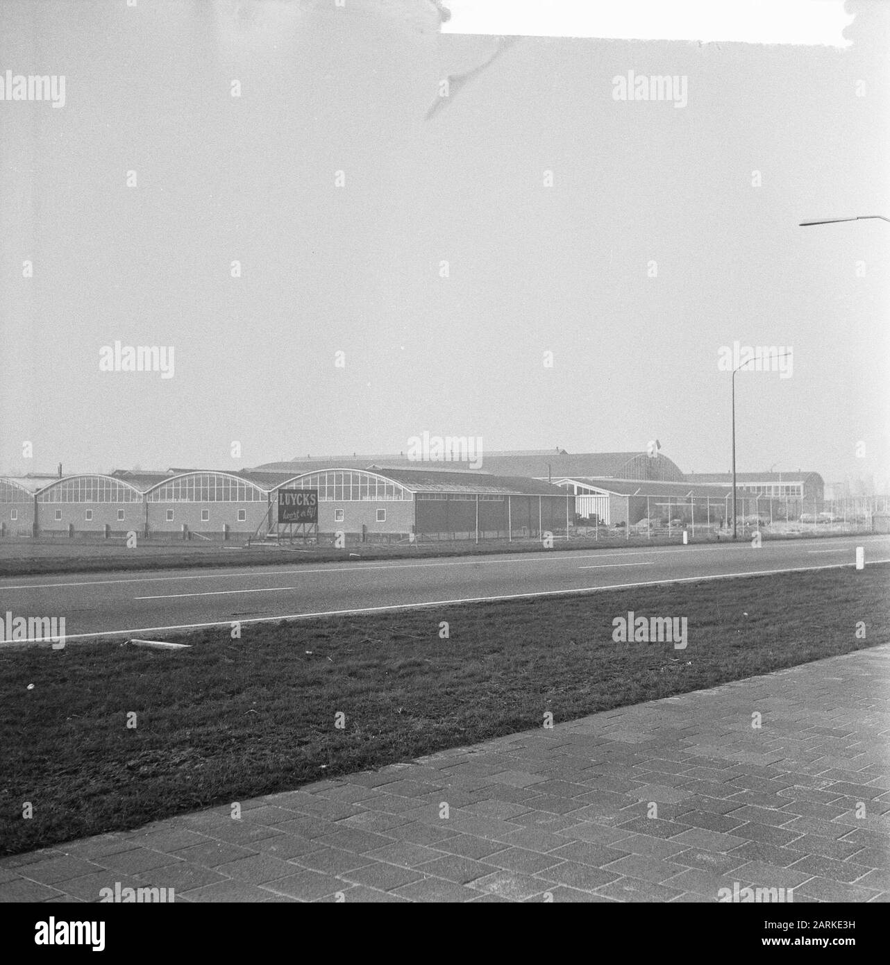 Factory exterior 1960s Black and White Stock Photos & Images - Alamy